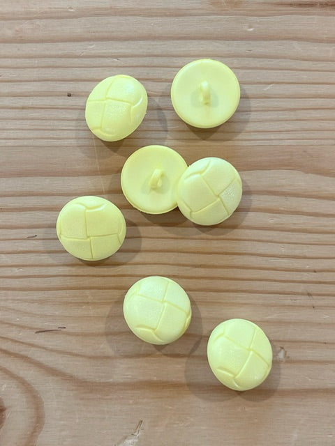 02-2606 End of Line Lemon Football Button 28L – Button-Company